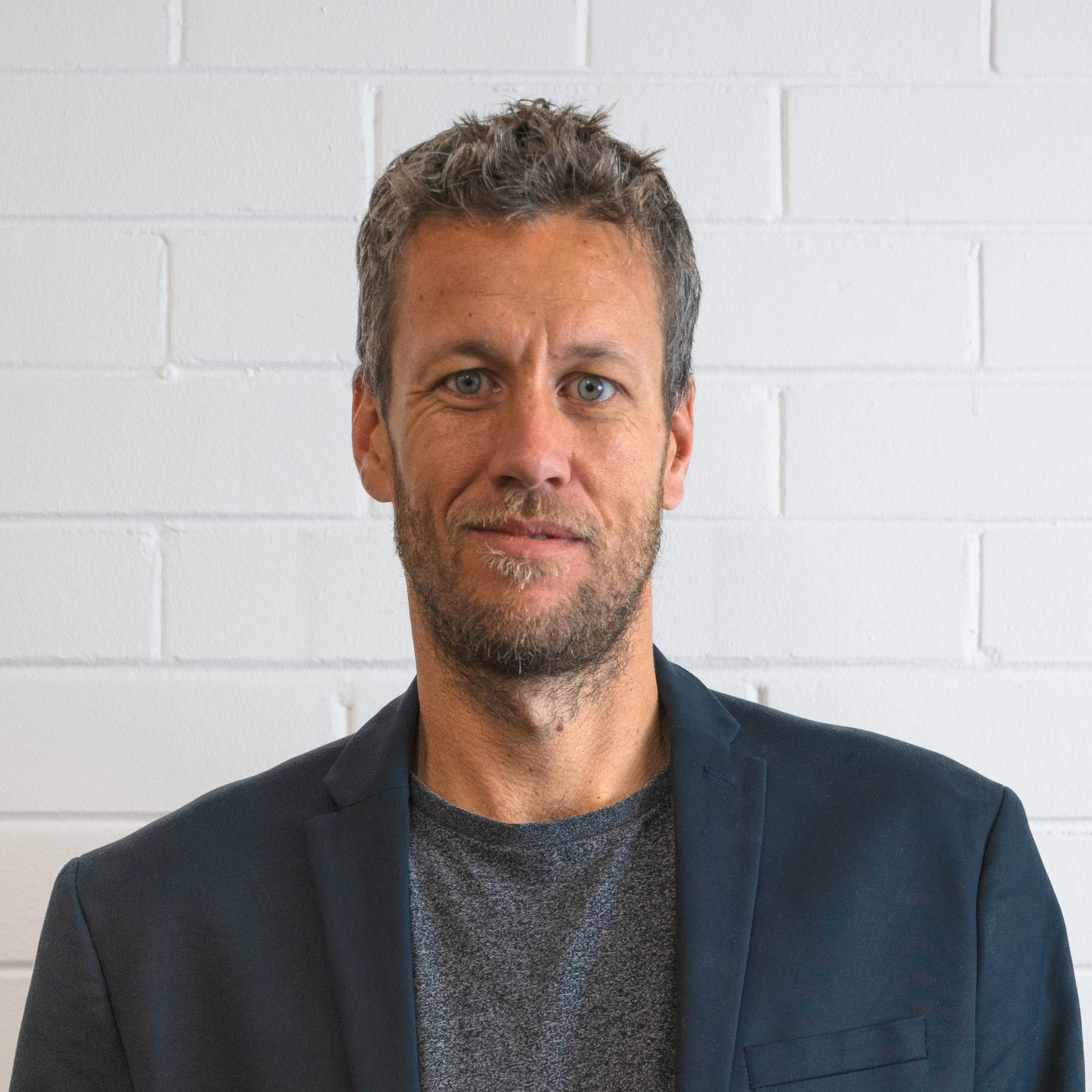 James-standing-high-res_crop-scaled.jpg